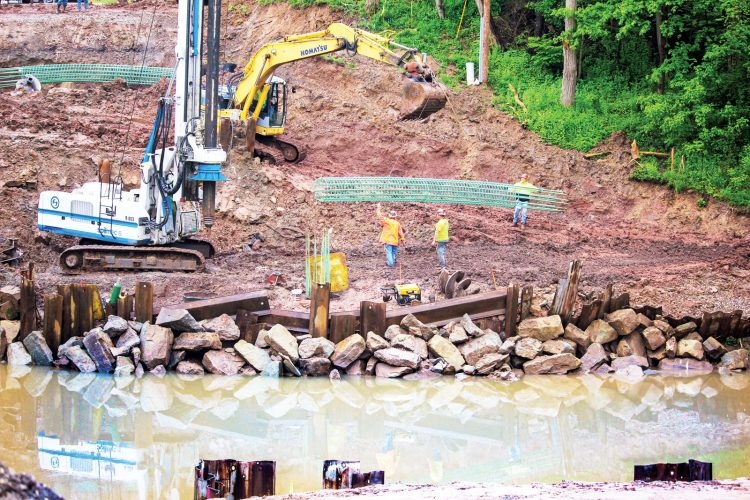 Road crews adapt to rainy conditions as work continues | News, Sports ...